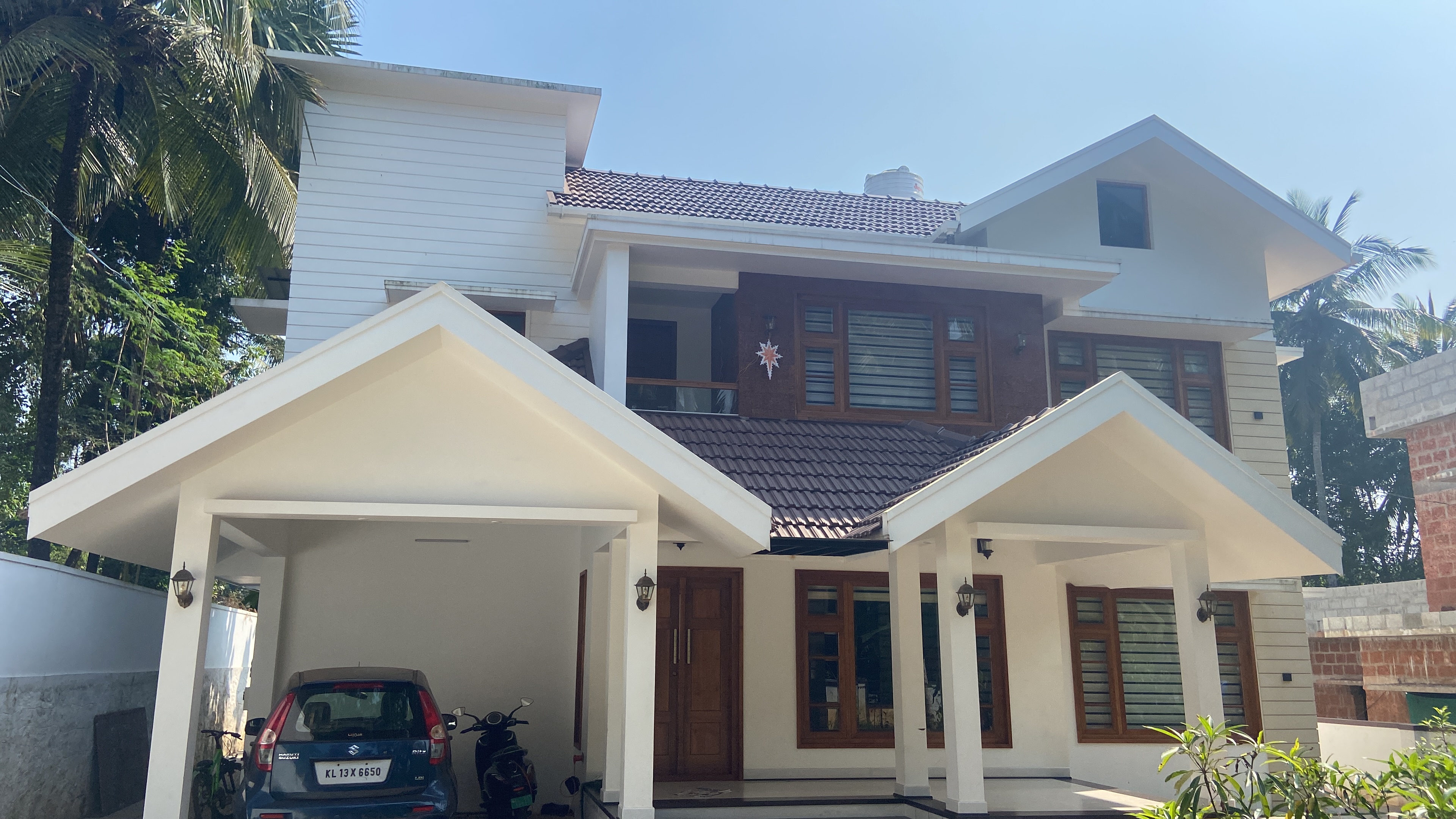 Best and Trusted Construction Company in Calicut | Luxury Villas in Kozhikode | WOOD AND STONE